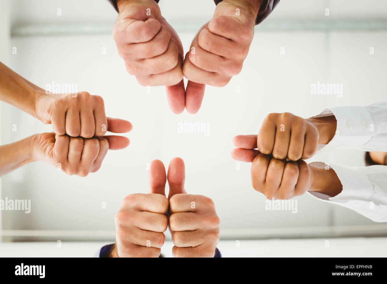 Multiple hands giving thumbs up Stock Photo - Alamy