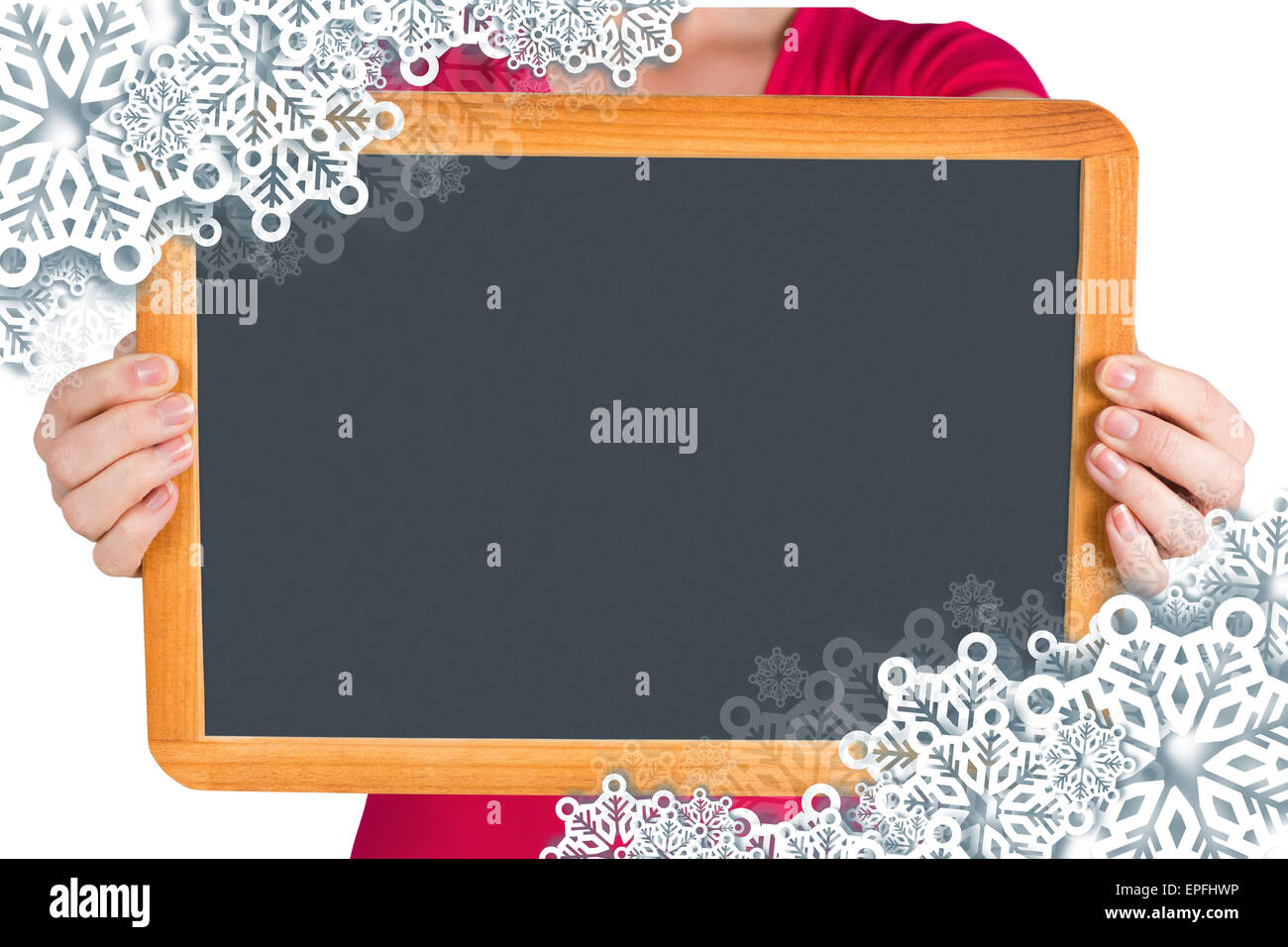 Woman showing chalkboard to camera Stock Photo - Alamy