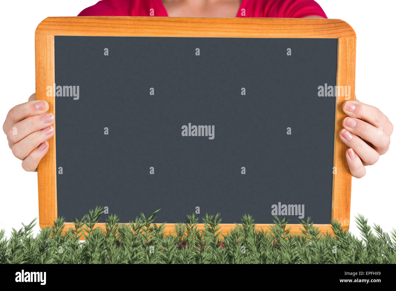 Woman showing chalkboard to camera Stock Photo - Alamy