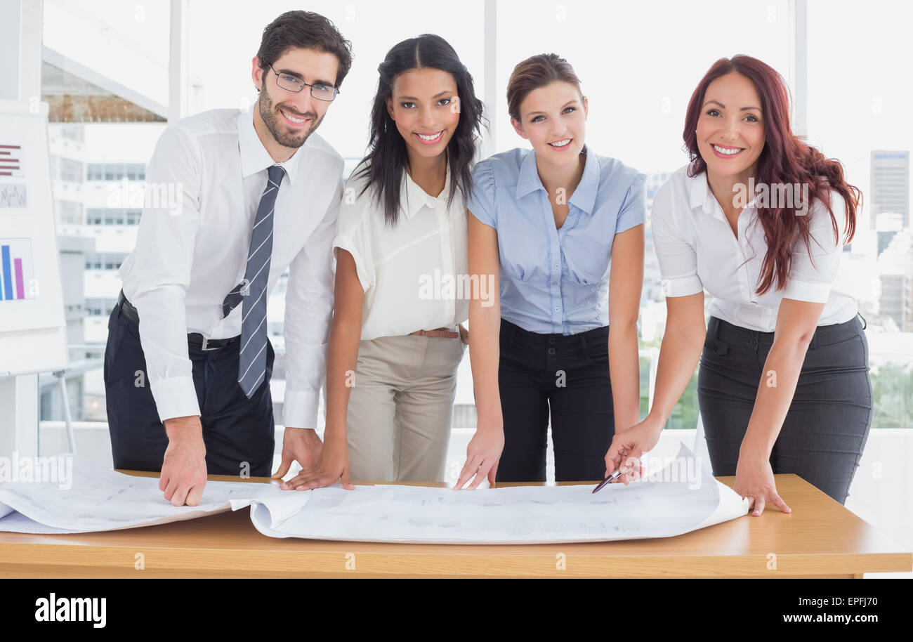 Business team smiling at camera Stock Photo - Alamy
