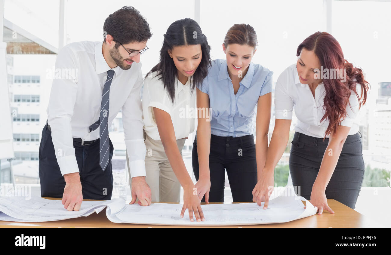 Businesswoman explaining plans colleagues hi-res stock photography and ...