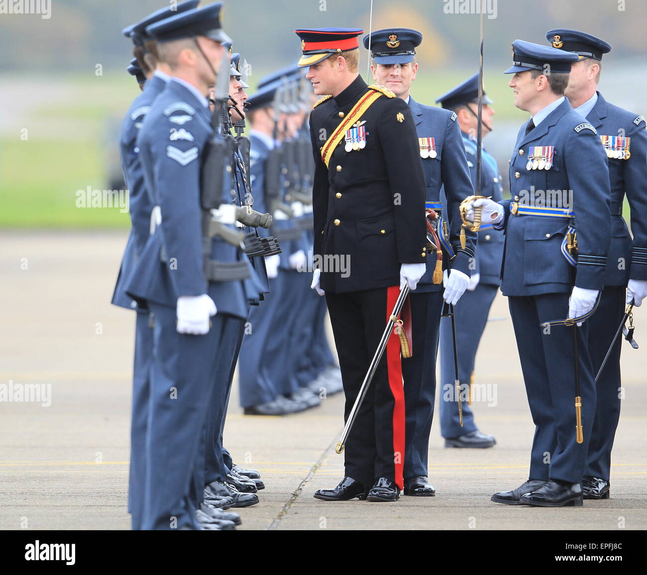 Prince Harry, meets with service personnel and their families as he ...