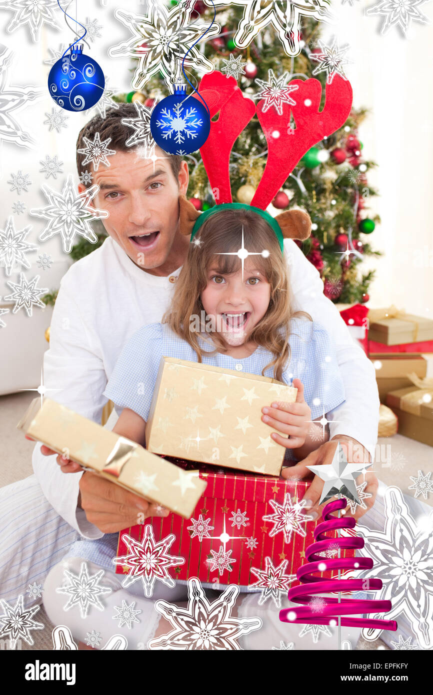 Surprised father and his girl opening christmas gifts Stock Photo - Alamy