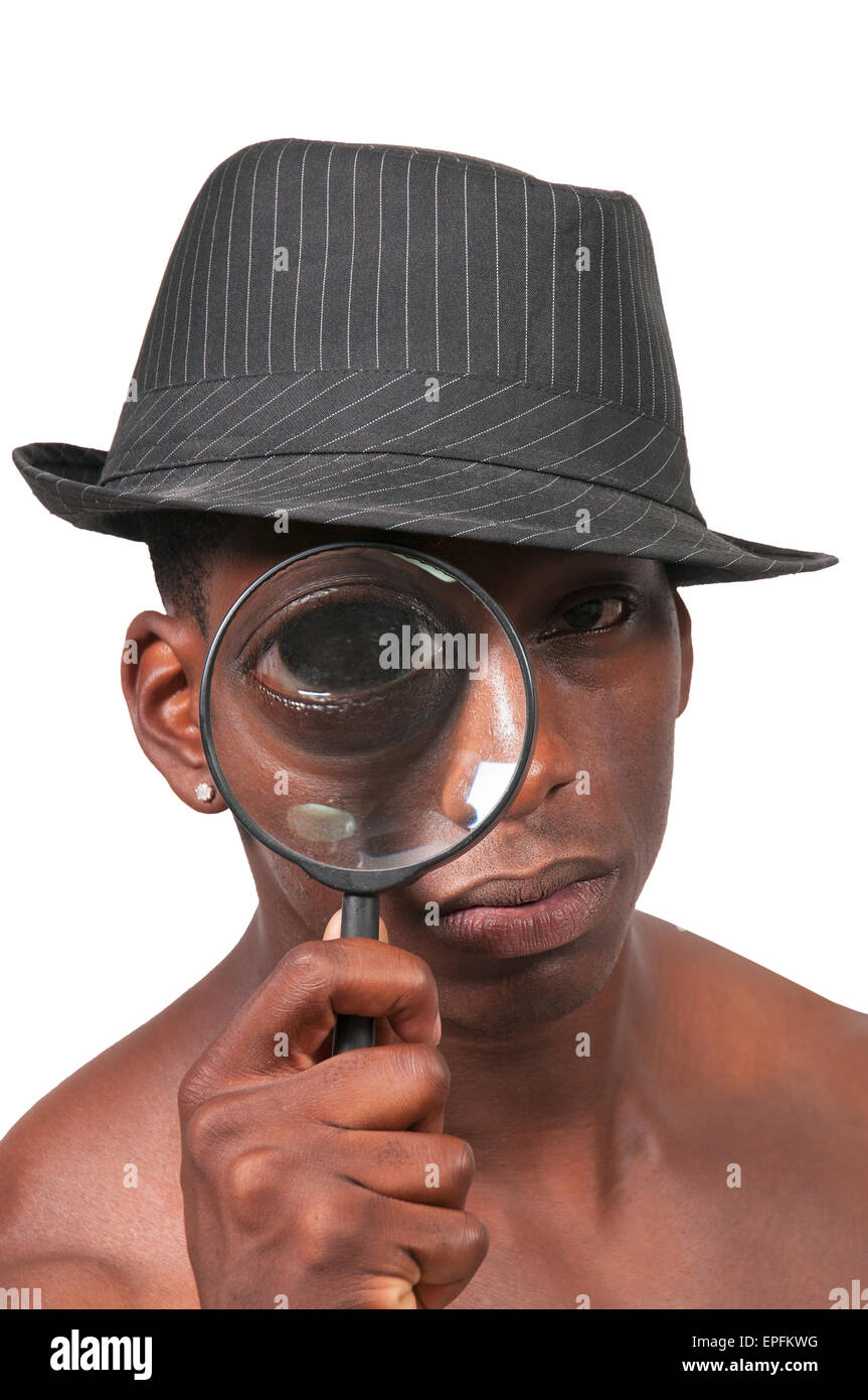 Black Man Looking through a magnifying glass Stock Photo - Alamy