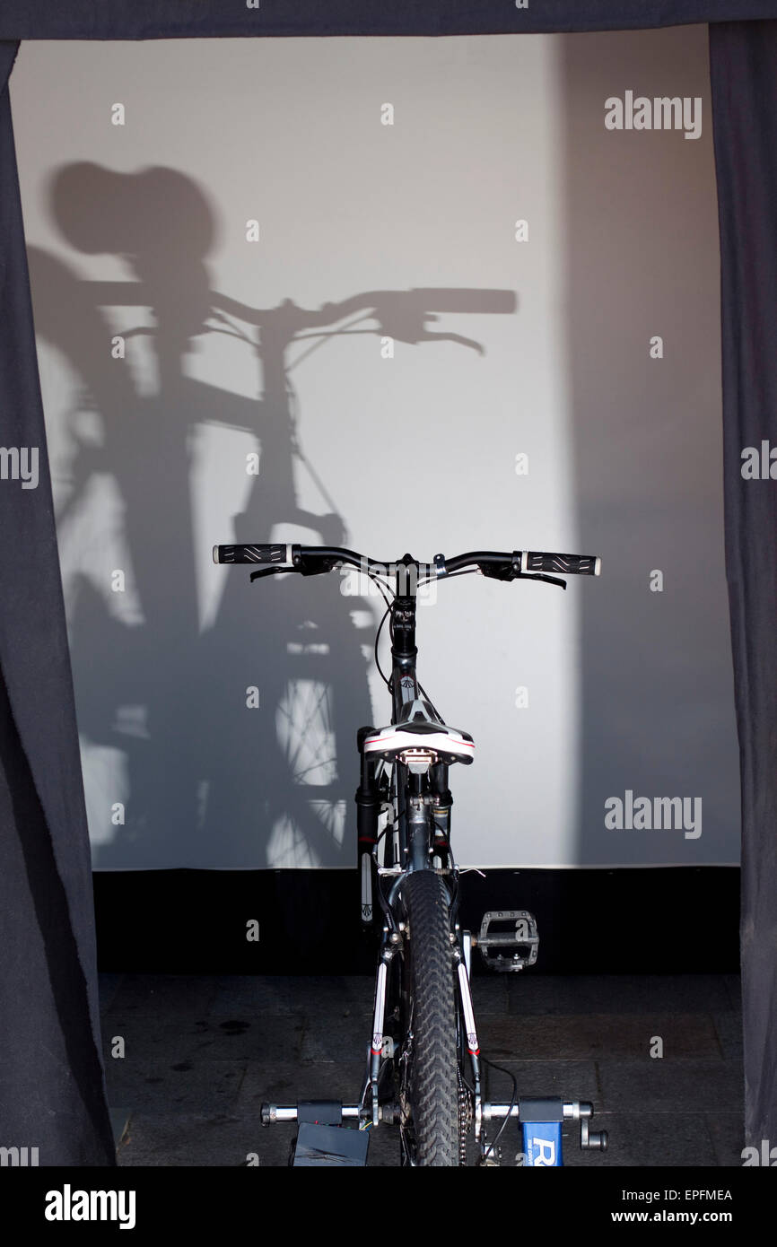 Mountain bike casts a shadow on a white screen Stock Photo - Alamy