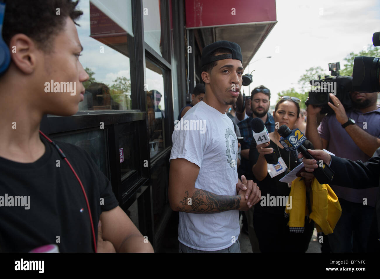 Queens, New York, USA. 17th May, 2015. Raymond Rivera, 19, describes the scene where Rapper ...