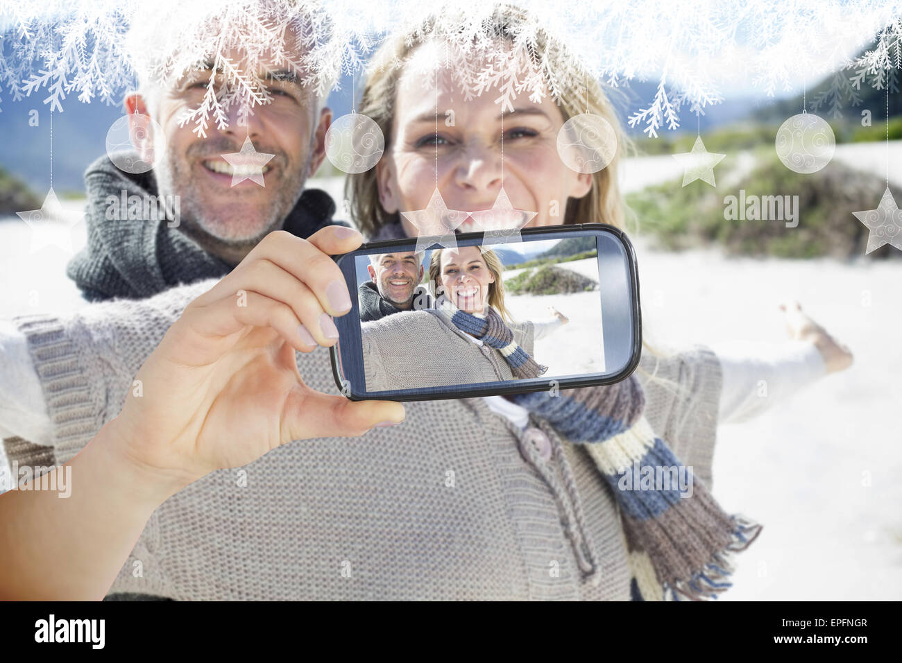 Hand holding smartphone showing photo Stock Photo - Alamy