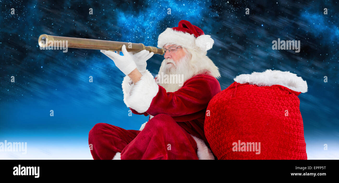 Composite image of santa claus looking through telescope Stock Photo ...