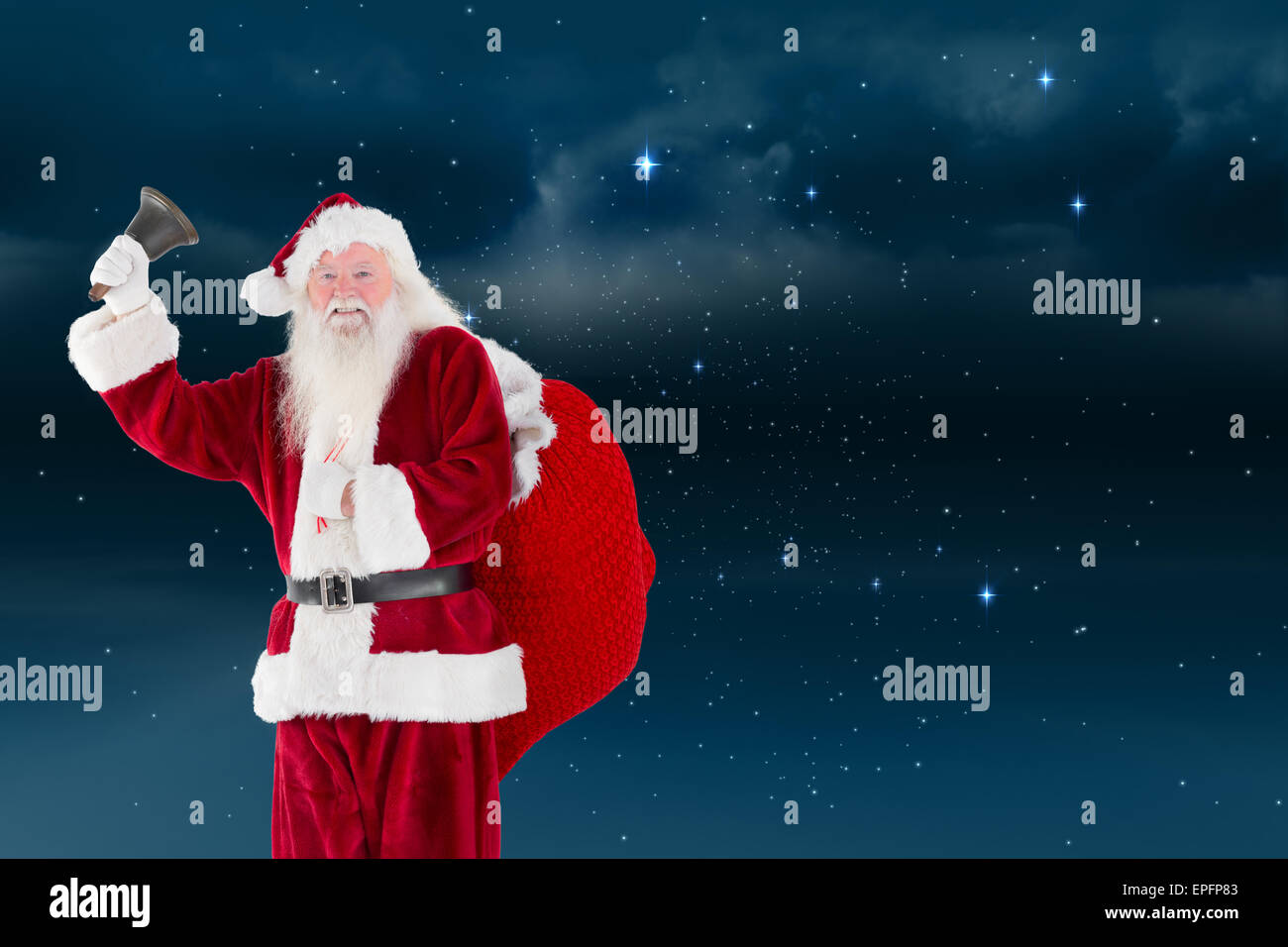 Composite image of santa claus ringing bell Stock Photo - Alamy