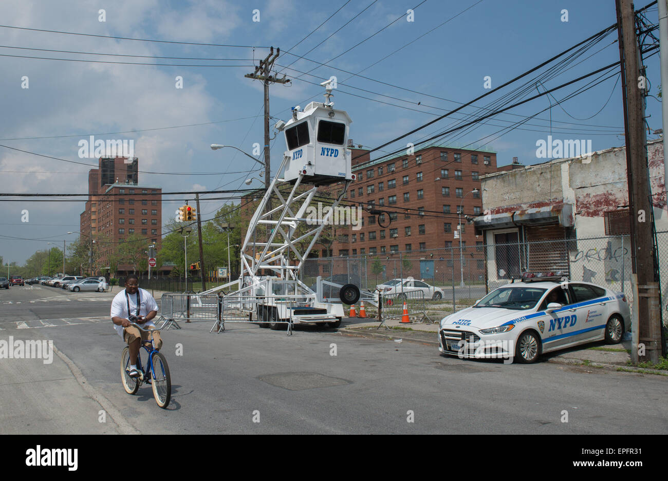 Queens, New York, USA. 17th May, 2015. A mobile NYPD tower stands watch ...