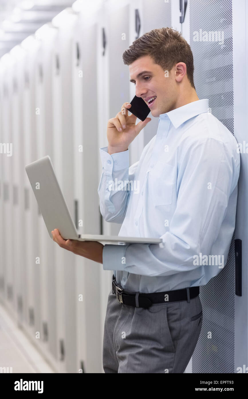 Smiling tech hi-res stock photography and images - Alamy