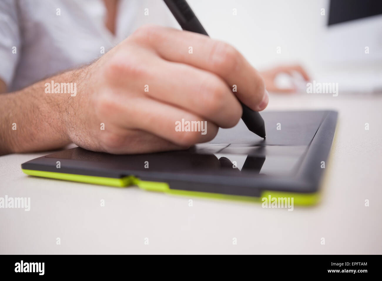 Designer using graphics tablet and colour wheel Stock Photo - Alamy