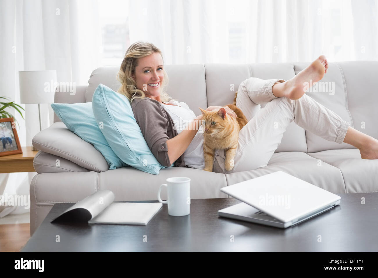 Woman hugging cuddling petting hi-res stock photography and images - Alamy