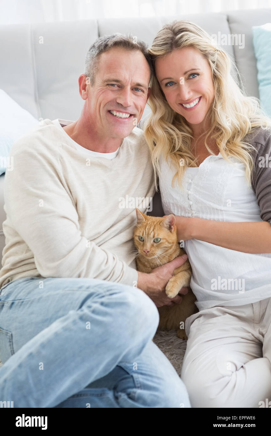 Couple 40s with cat at home hi-res stock photography and images - Alamy