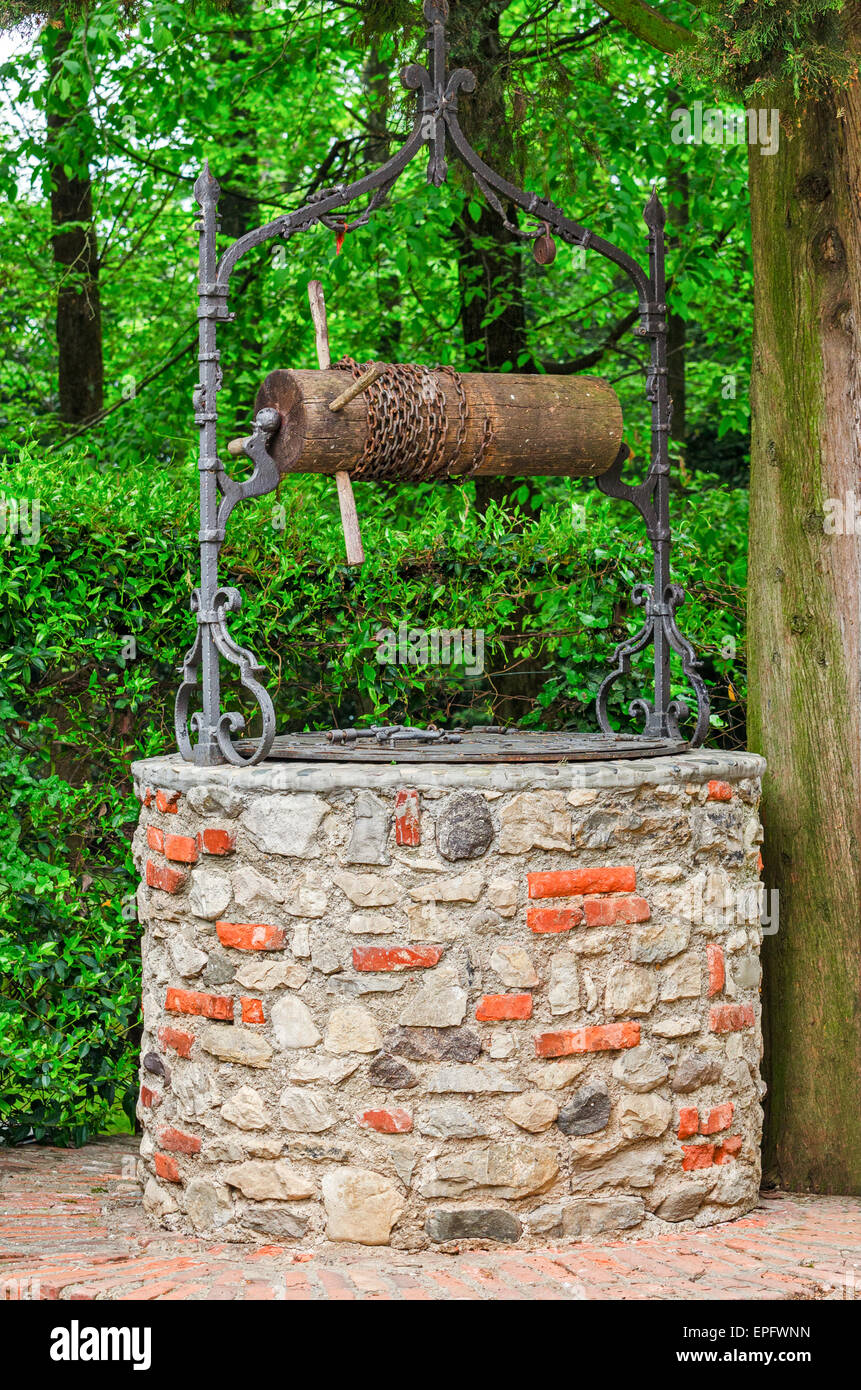 Old stone water well Stock Photo - Alamy