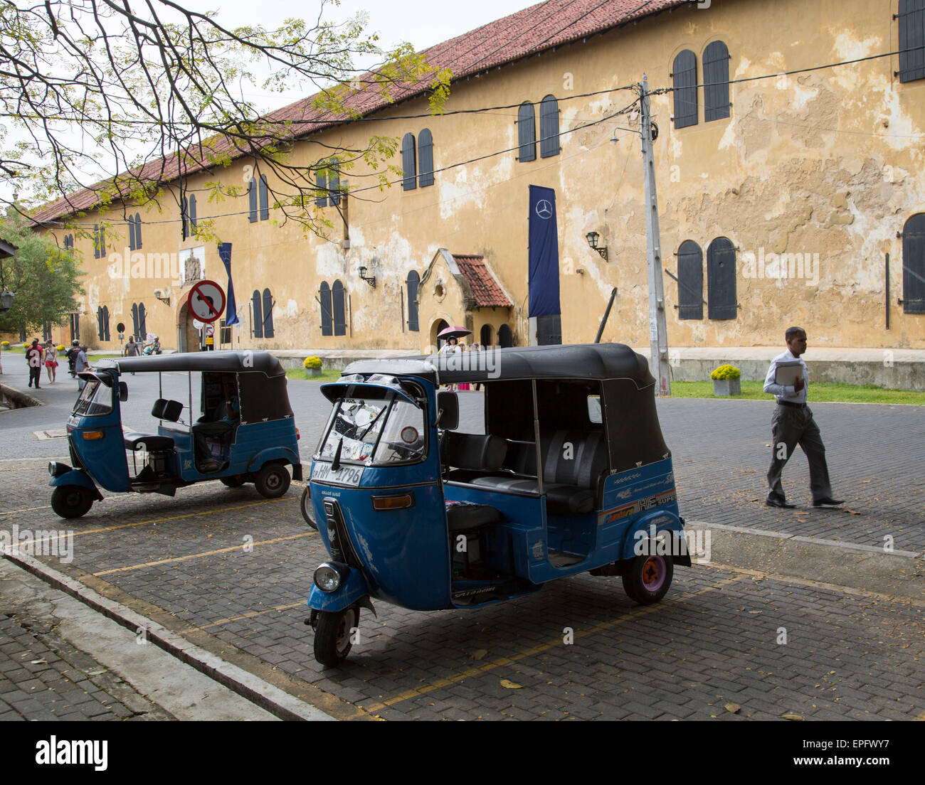 Motor rickshaw known as tuk-tuks inside the fort area of historic town ...
