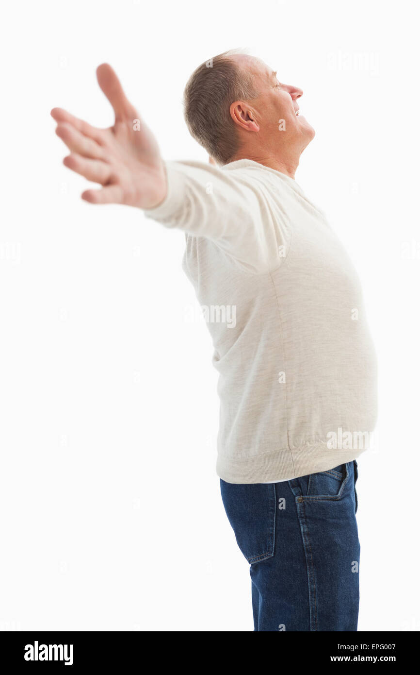 Happy mature man with hands out Stock Photo - Alamy