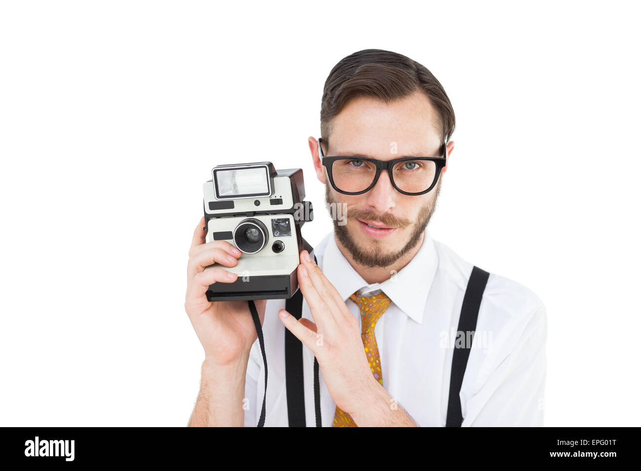 Geeky hipster holding a retro camera Stock Photo - Alamy