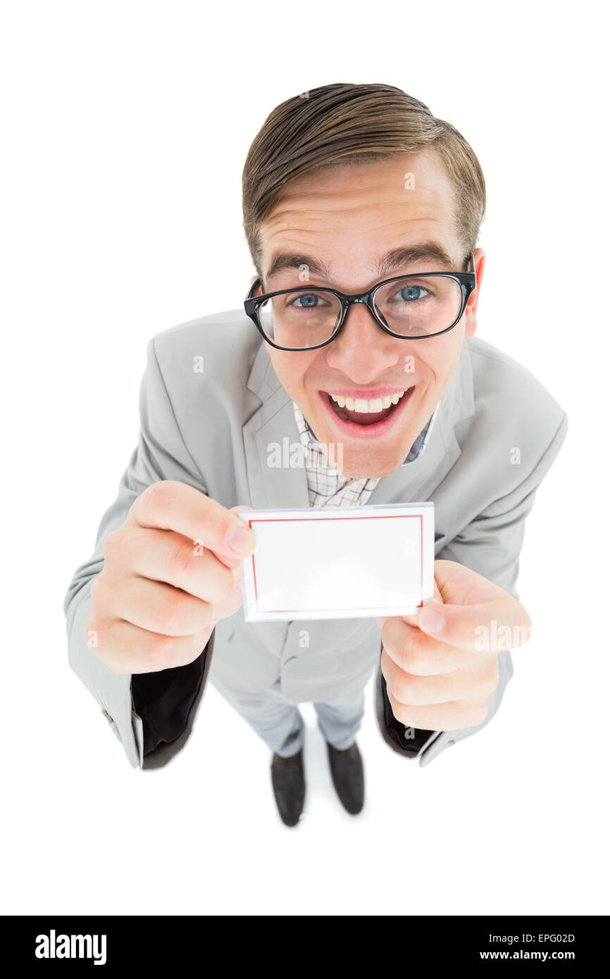Geeky hipster smiling and showing card Stock Photo - Alamy