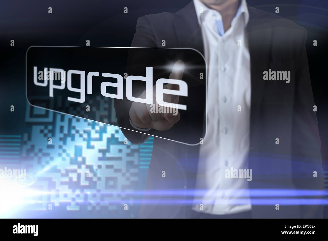 Businessman pointing to word upgrade Stock Photo - Alamy