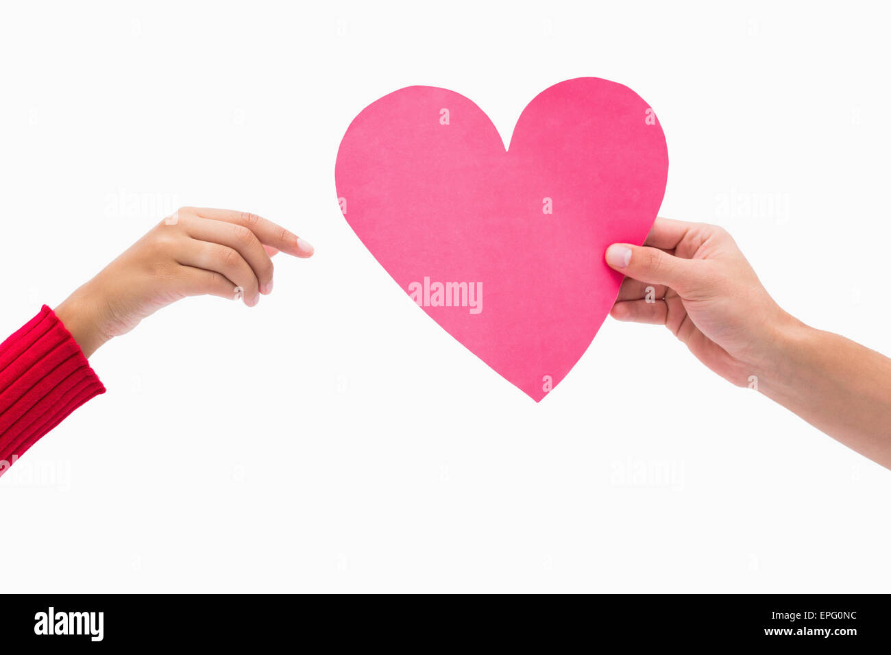 Man passing woman pink heart Stock Photo - Alamy