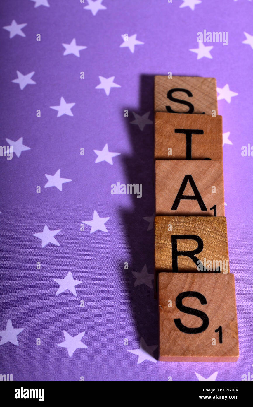 Wood letters spelling out the word stars Stock Photo - Alamy