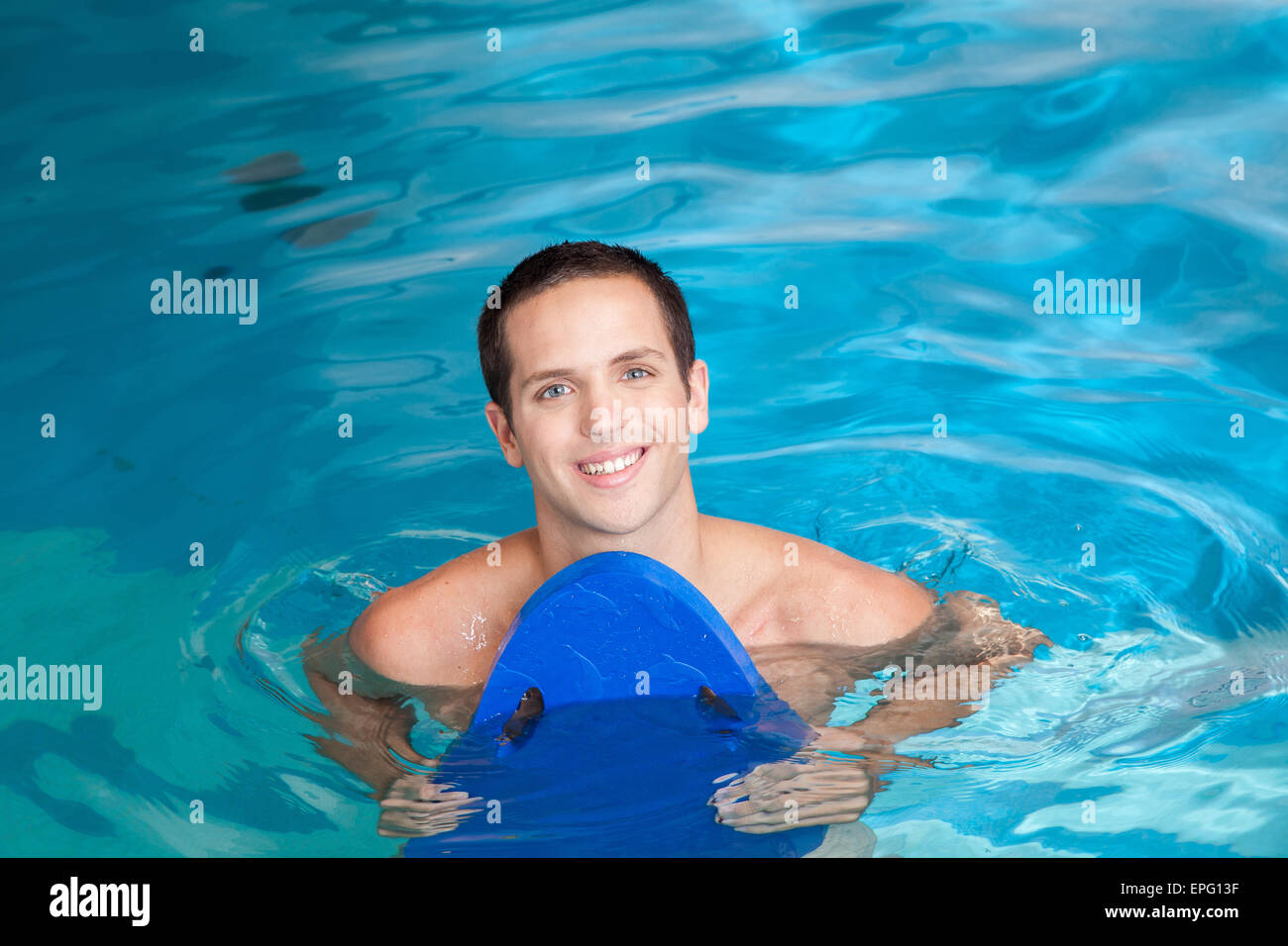 Man in the pool Stock Photo - Alamy