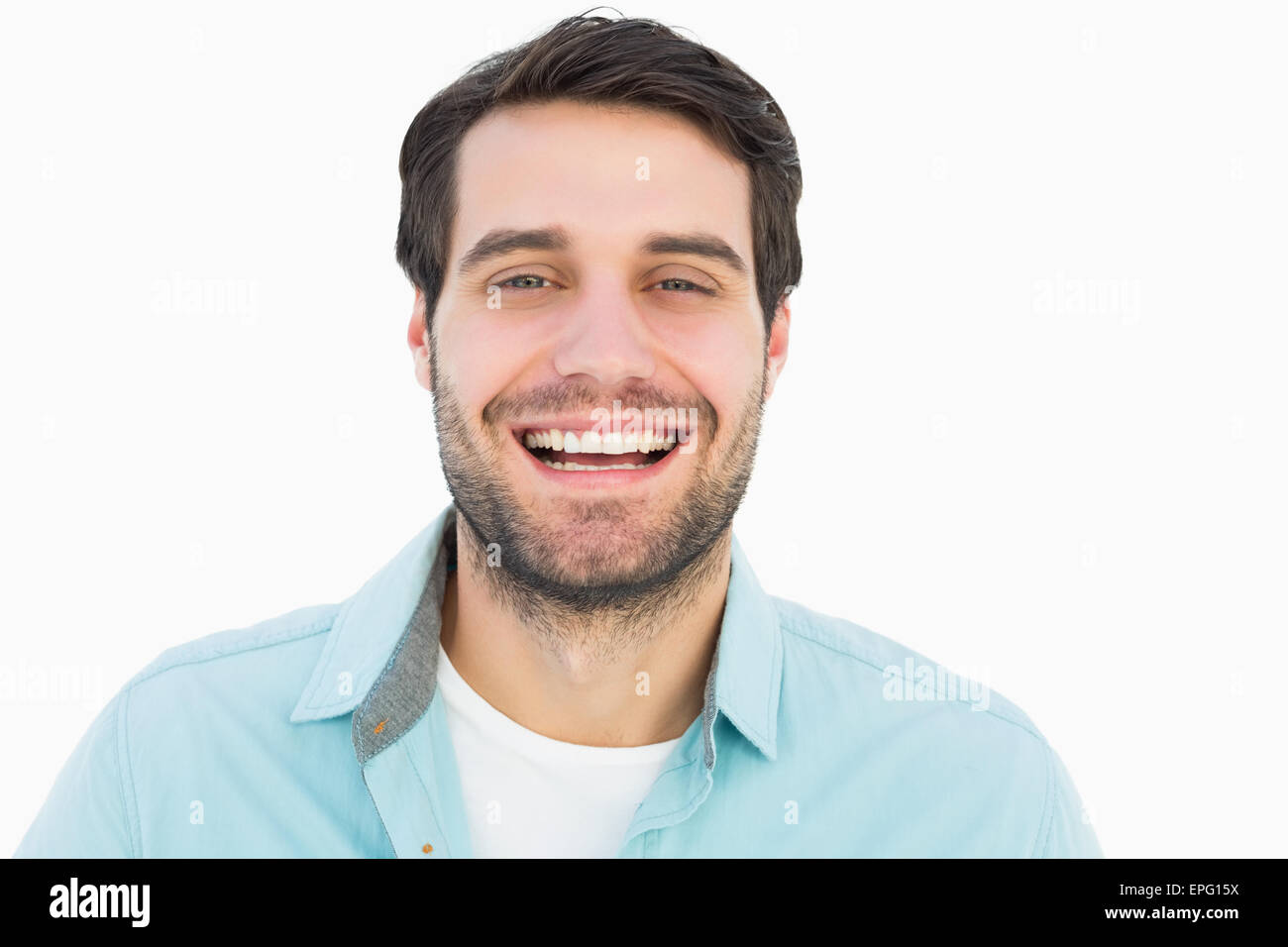 Happy casual man smiling at camera Stock Photo - Alamy