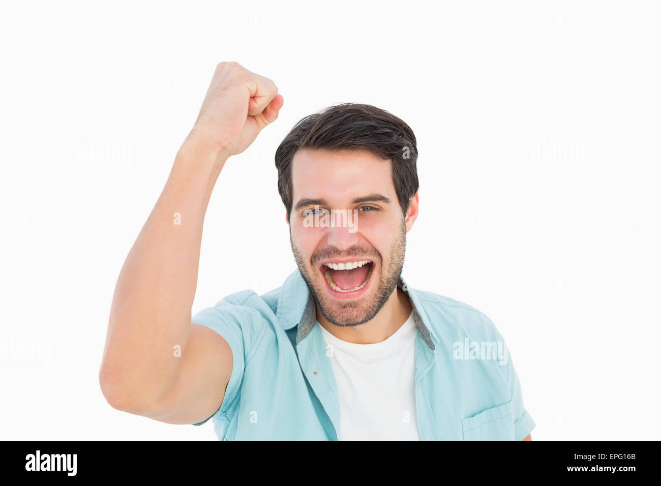 Happy casual man cheering at camera Stock Photo - Alamy