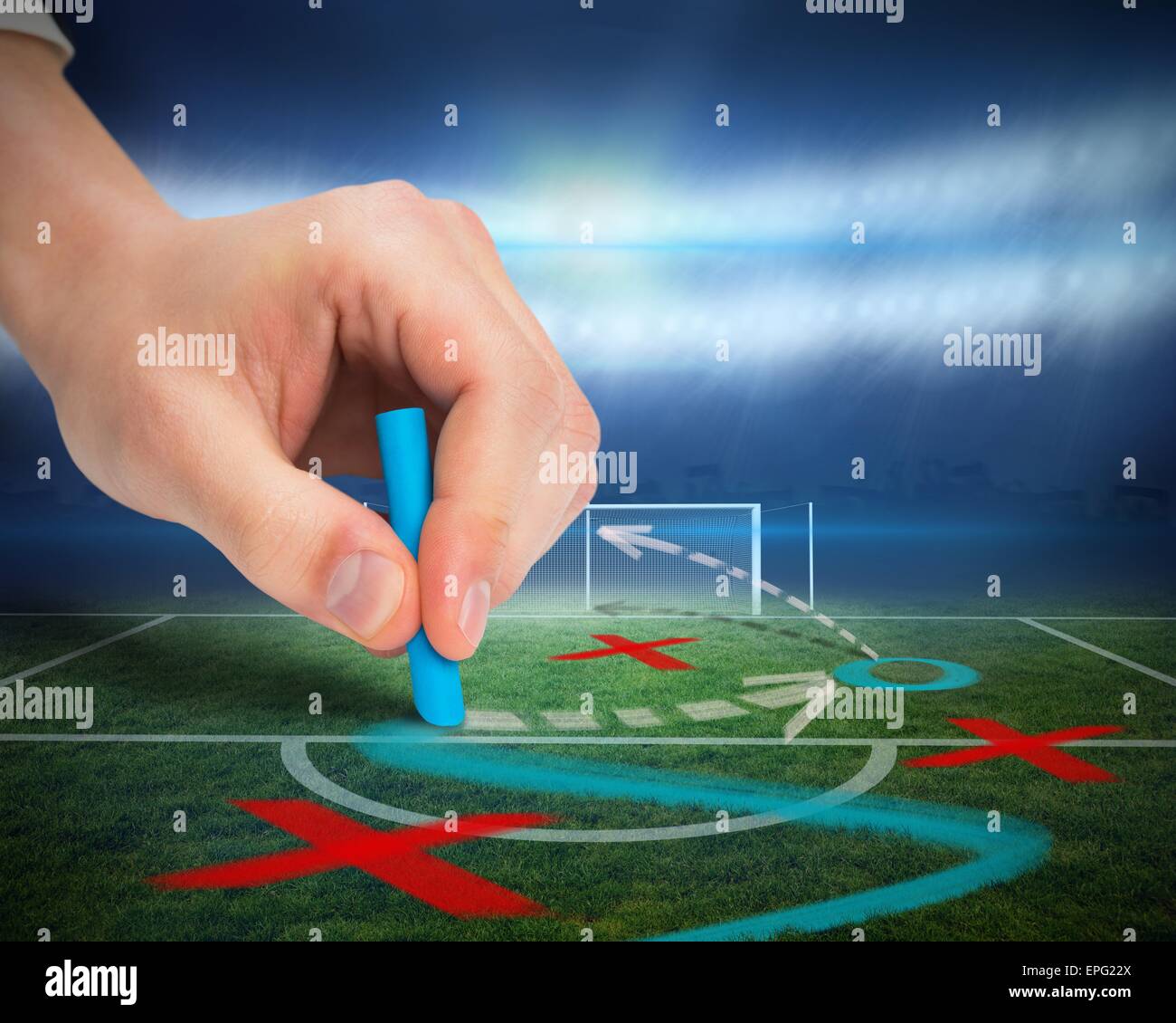 Hand drawing tactics on football pitch Stock Photo - Alamy