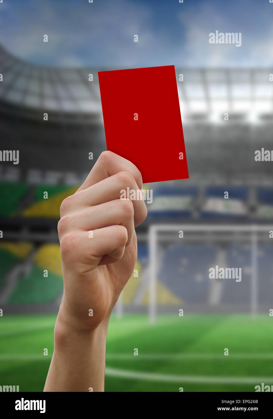 Composite image of hand holding up red card Stock Photo - Alamy Composite image of hand holding up red card Stock Photo - Alamy