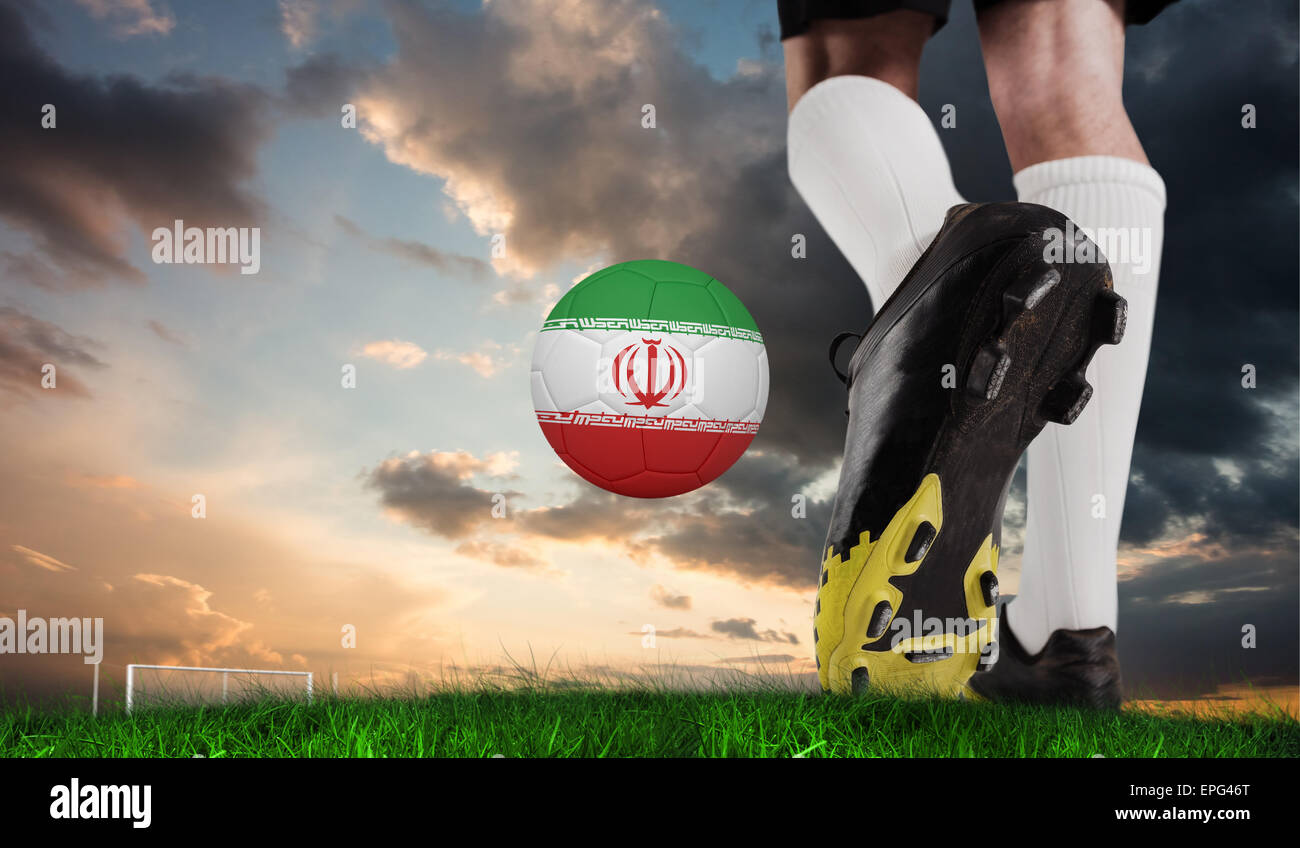Composite image of football boot kicking iran ball Stock Photo - Alamy