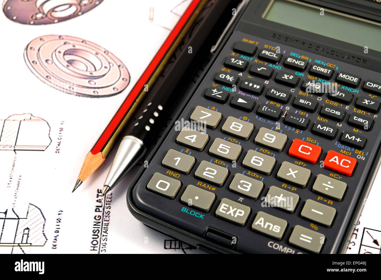 Scientific calculator, Pen and Pencil over the Engineering Drawing Map ...