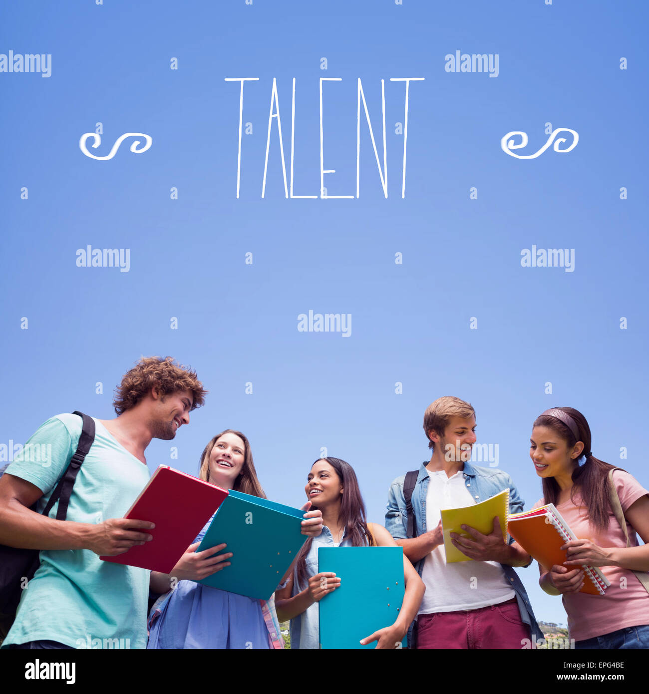 Talent against students standing and chatting together Stock Photo - Alamy
