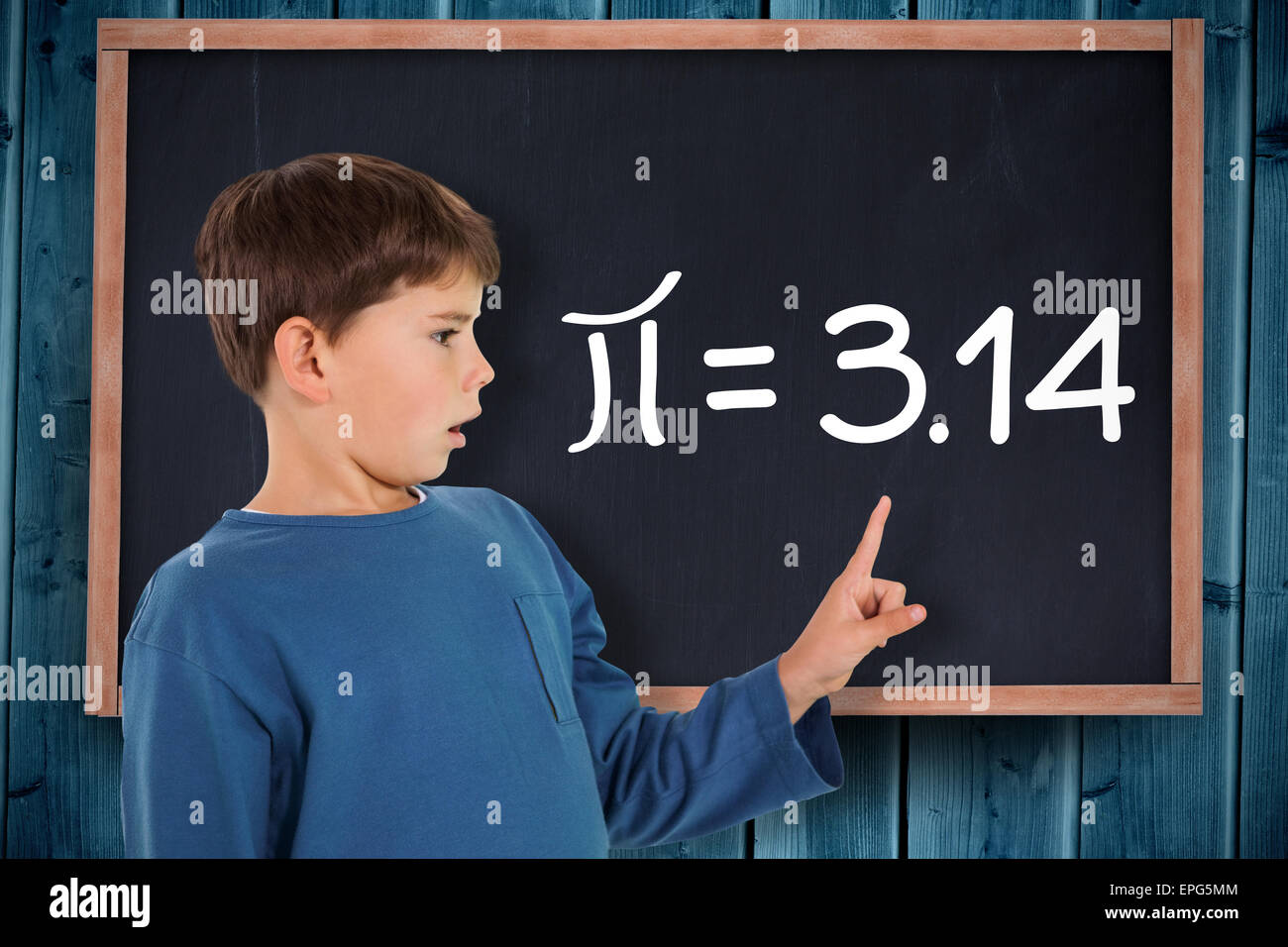 Composite image of cute boy pointing Stock Photo - Alamy