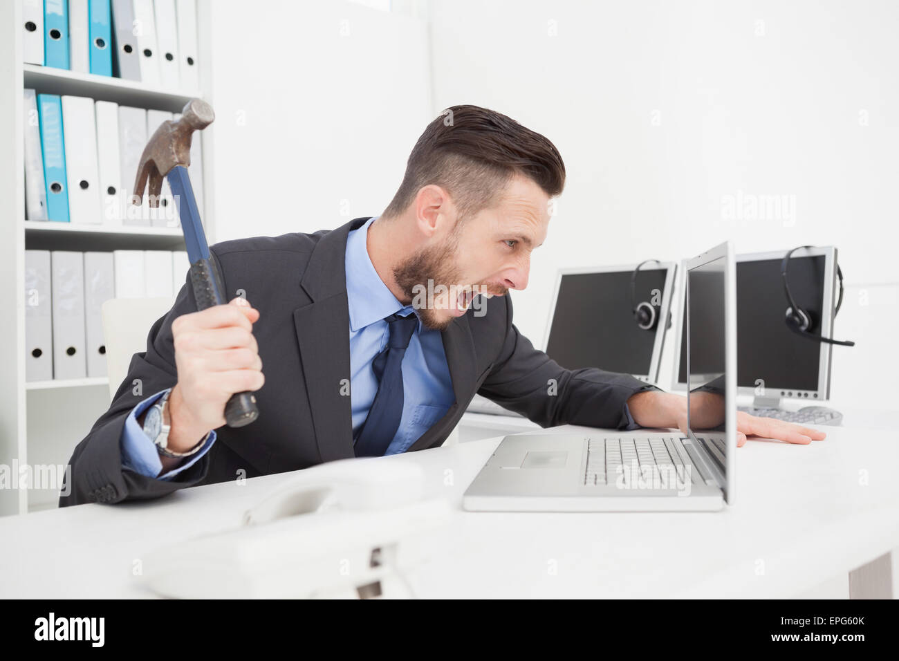 Angry furious businessman using hi-res stock photography and images - Alamy