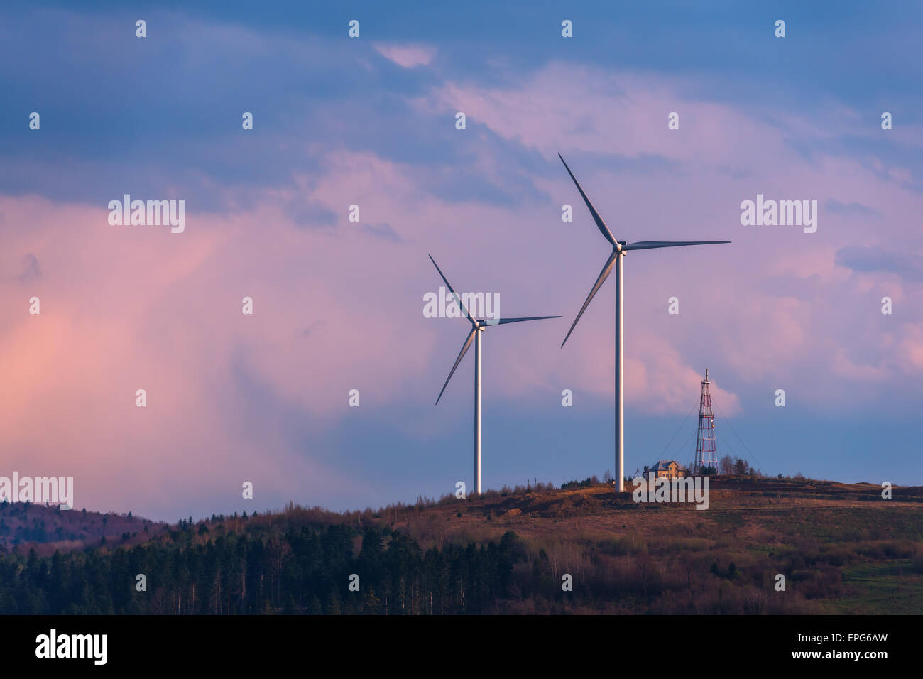 wind turbine on sunset background Stock Photo - Alamy