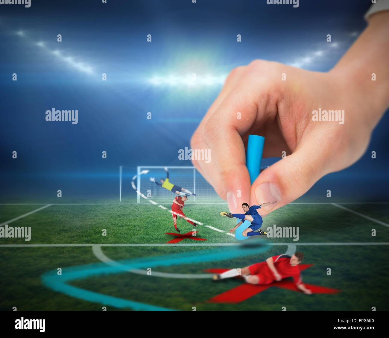 Hand drawing tactics on football pitch during match Stock Photo - Alamy