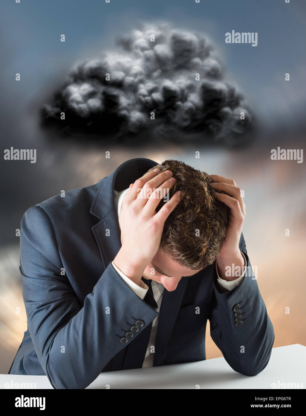 Composite image of businessman with head in hands Stock Photo - Alamy