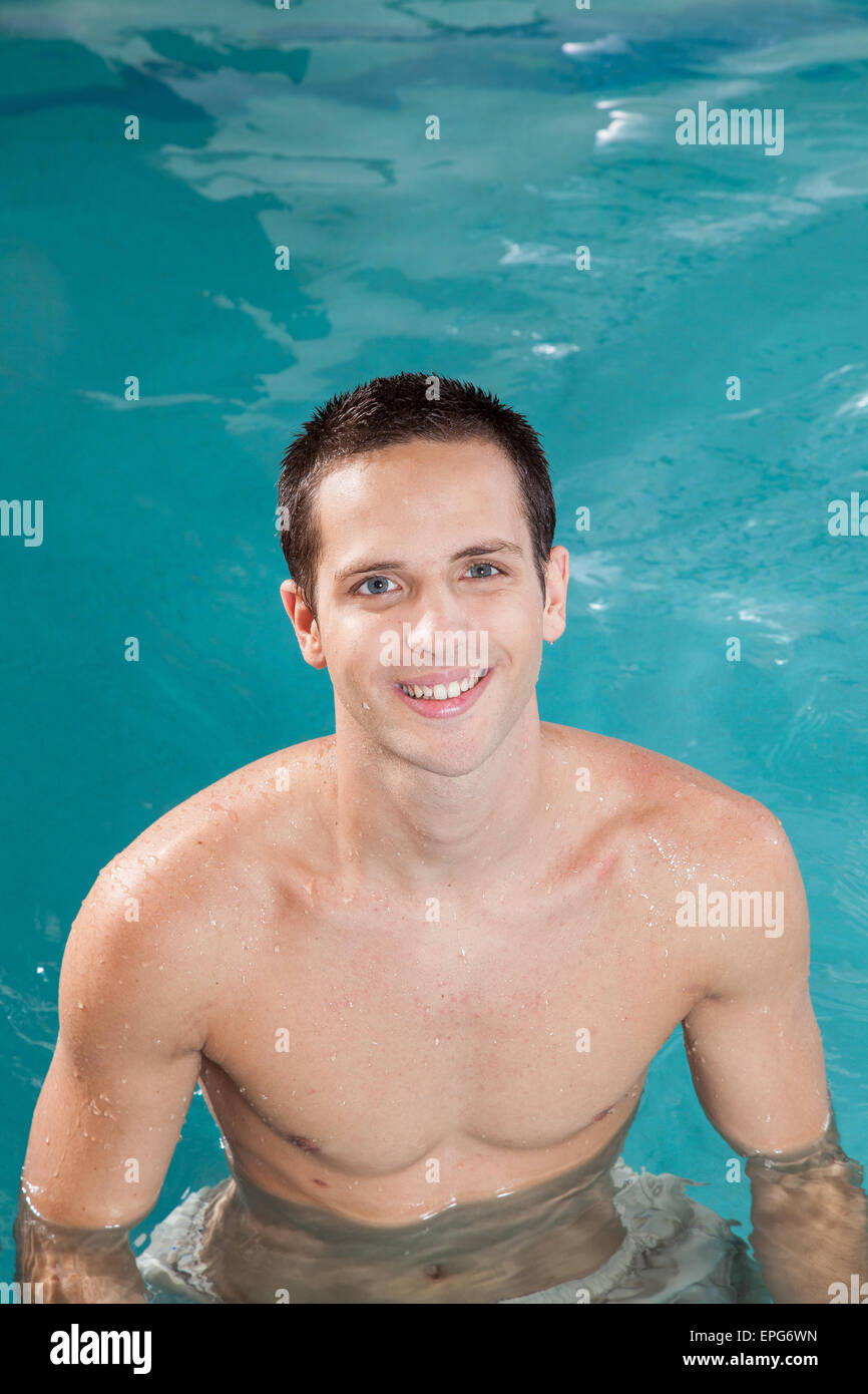 Man in the pool Stock Photo - Alamy