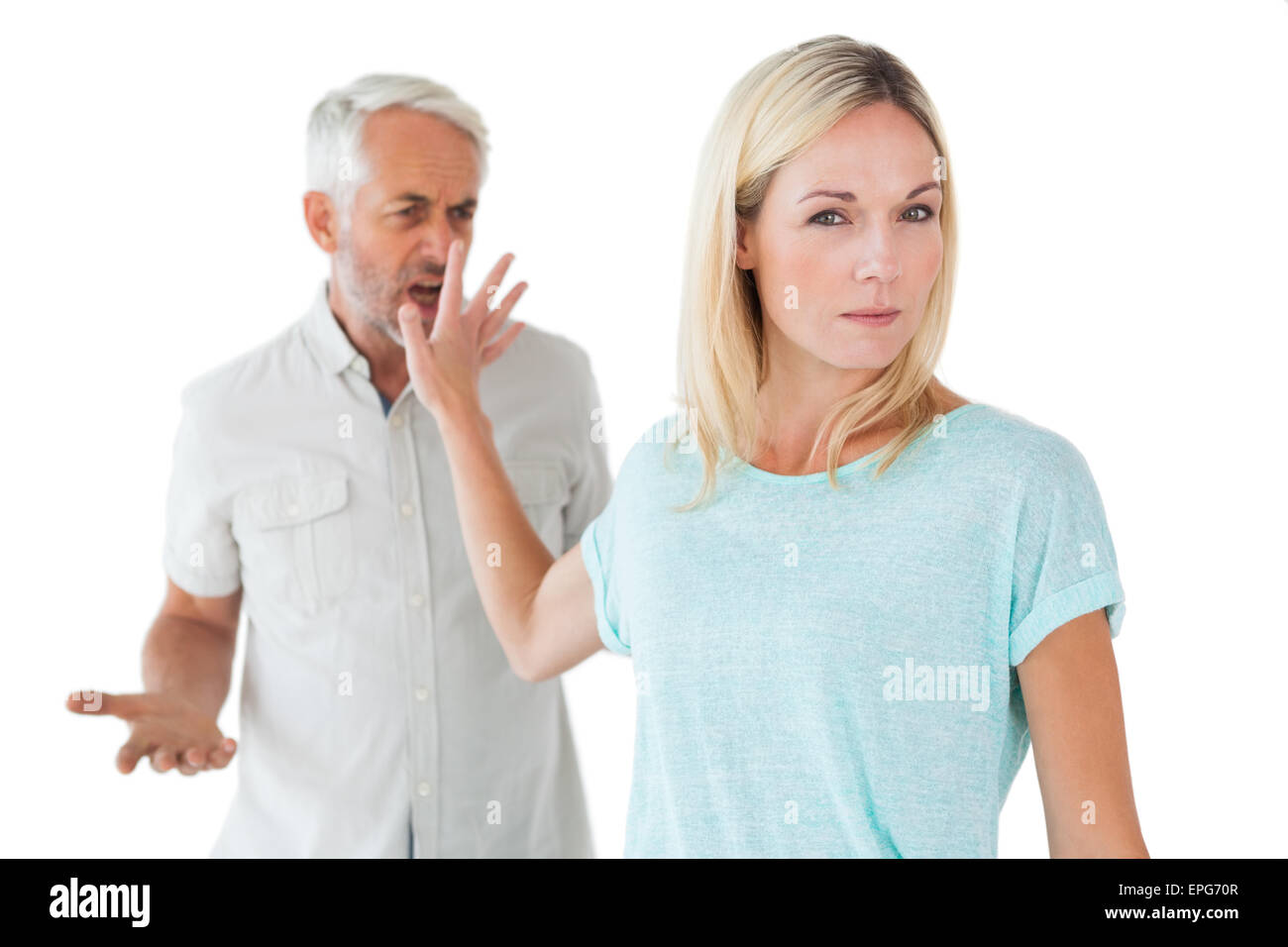 Woman not listening to her angry partner Stock Photo - Alamy