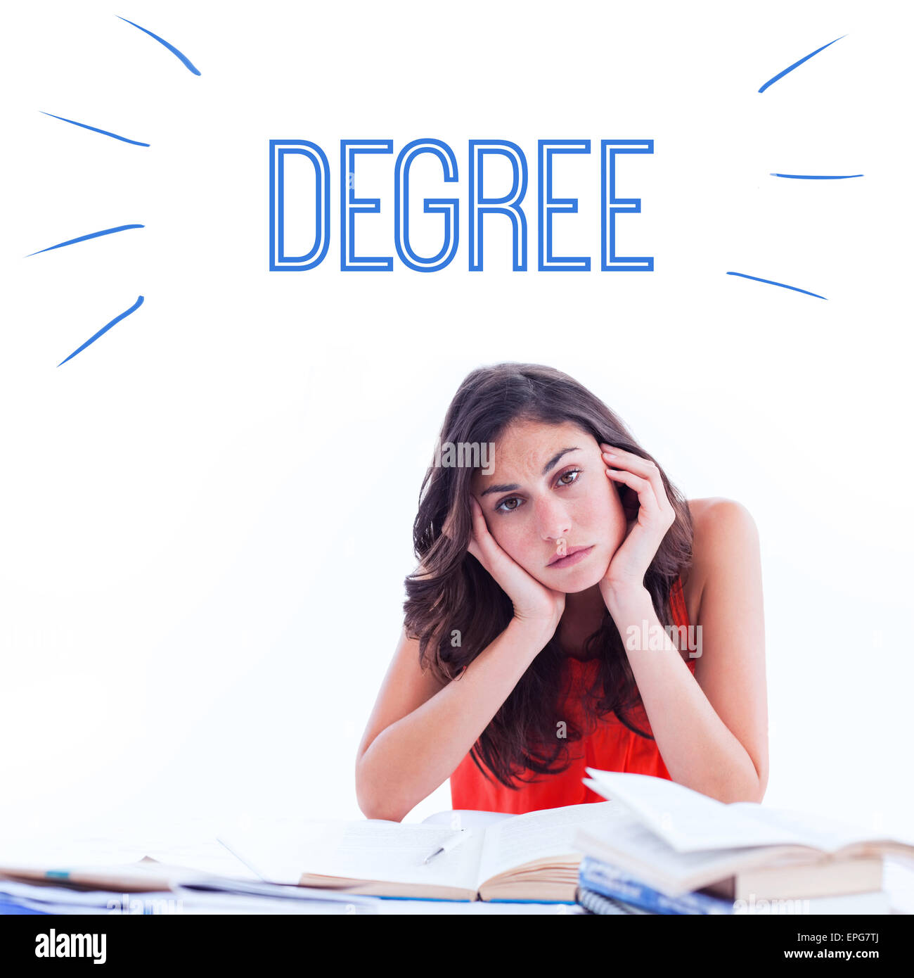 Degree against stressed student at desk Stock Photo - Alamy