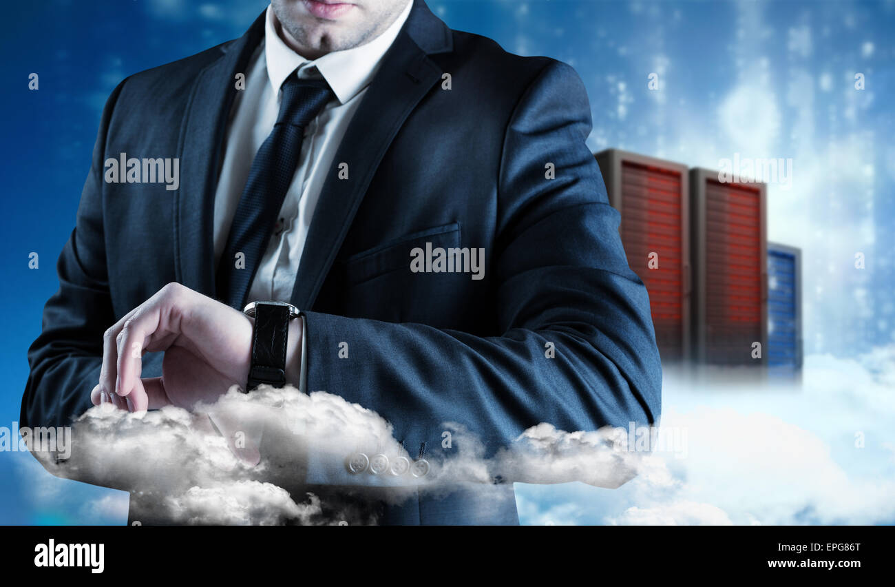 Composite image of businessman checking the time on watch Stock Photo ...