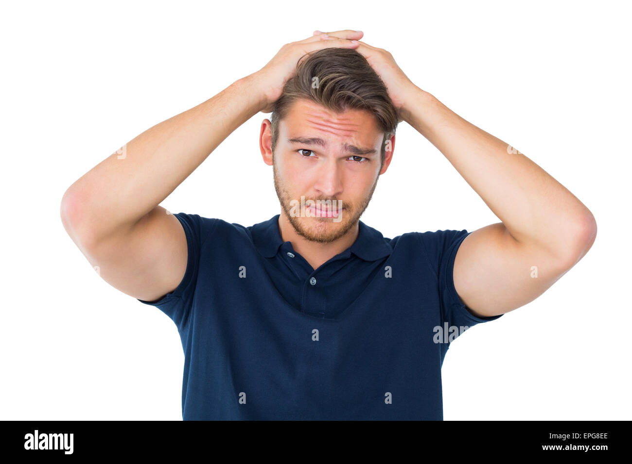 Handsome young man looking confused Stock Photo - Alamy