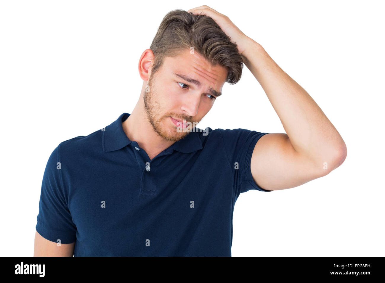 Handsome young man looking confused Stock Photo - Alamy