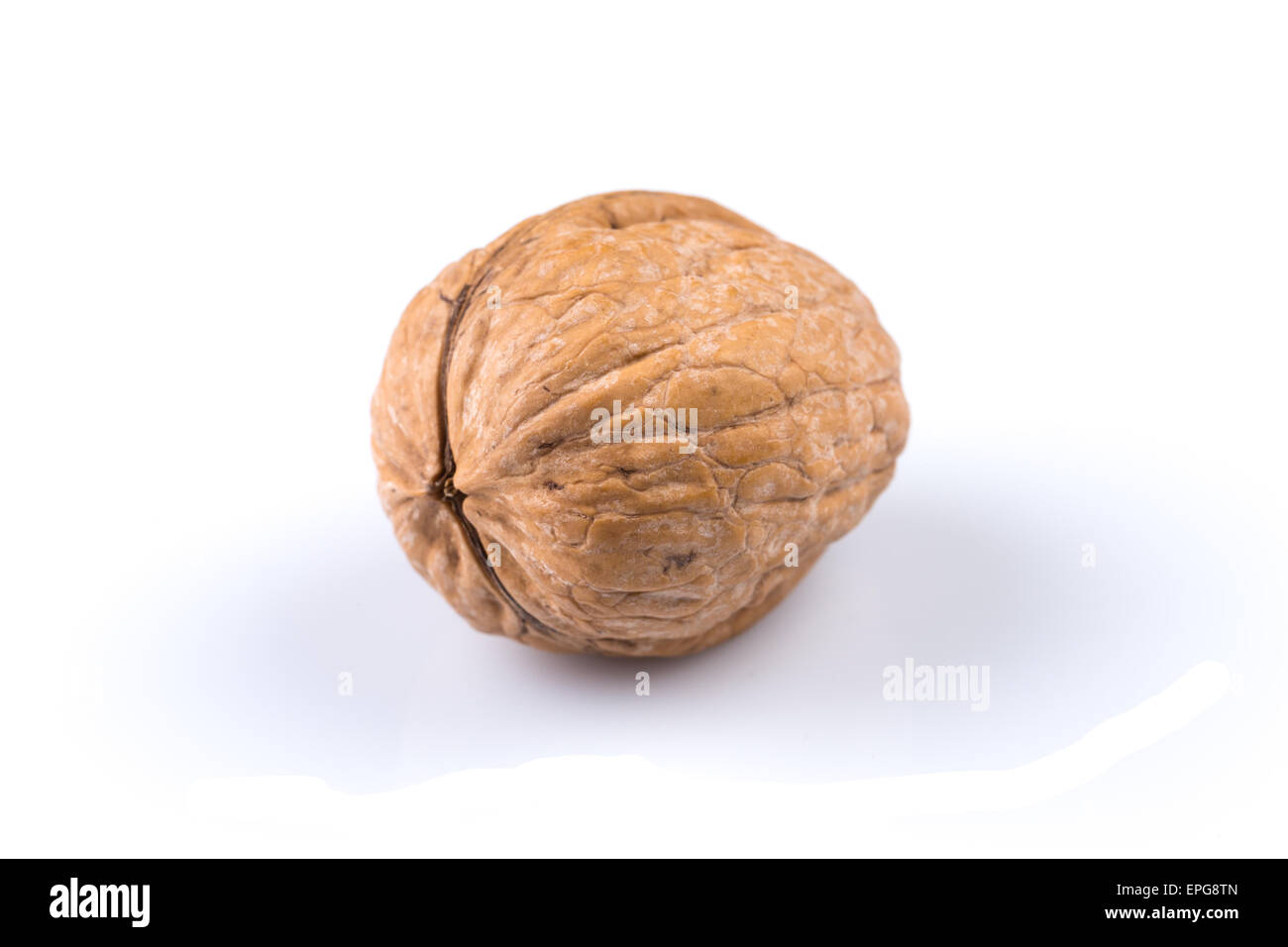 Dried walnut isolated on a white background Stock Photo - Alamy