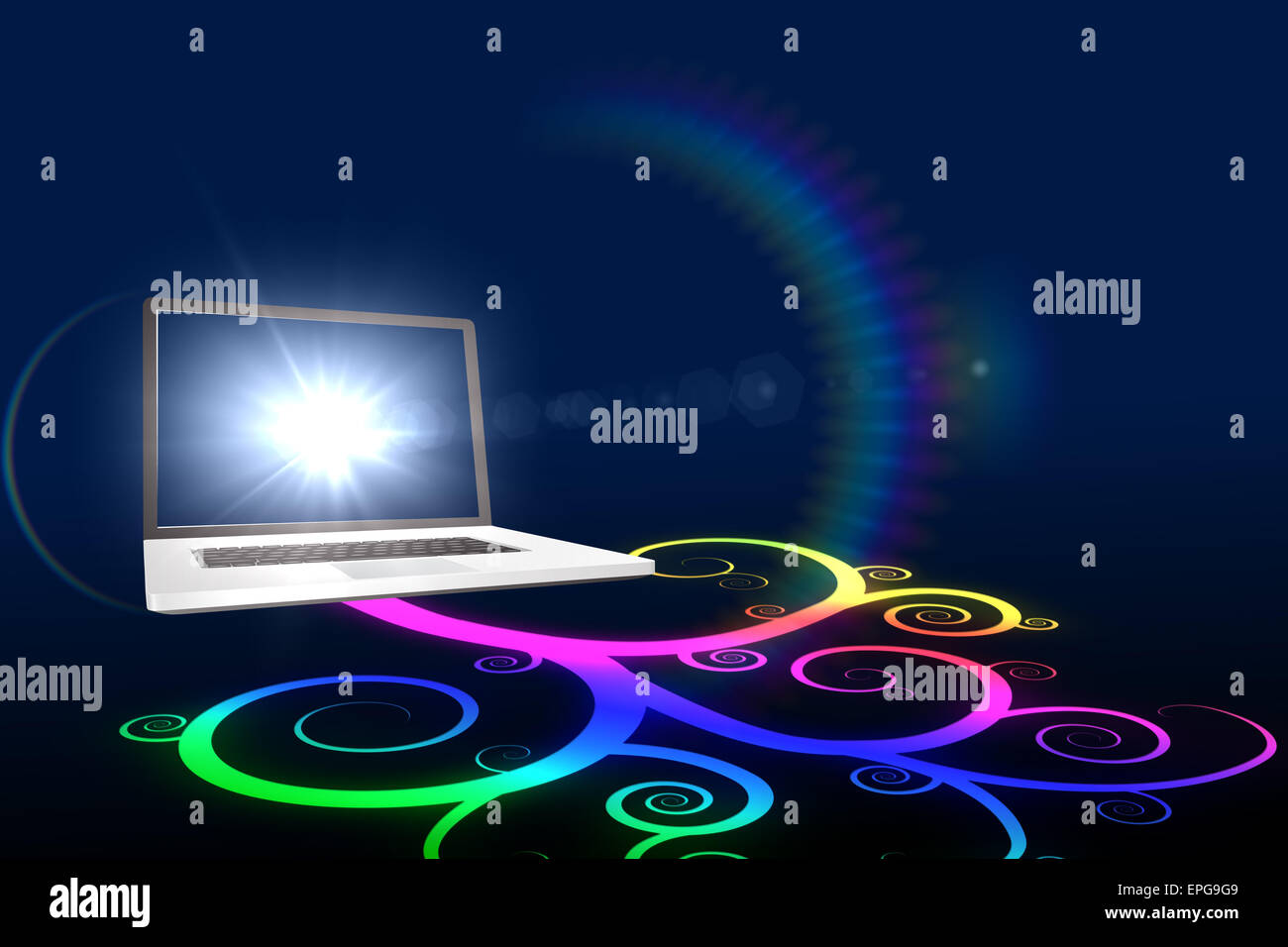 Laptop with colourful spiral design Stock Photo - Alamy