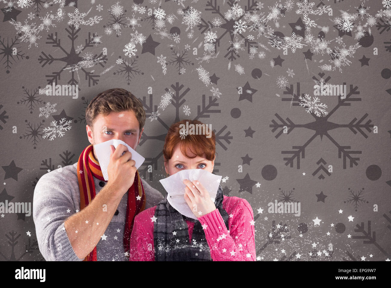 Composite image of couple blowing noses into tissues Stock Photo - Alamy