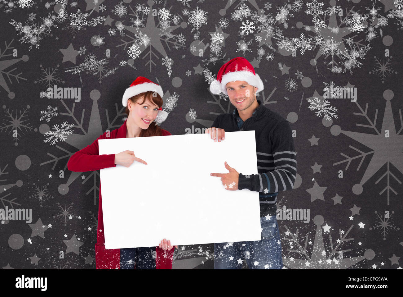 Couple holding a white sign together Stock Photo - Alamy