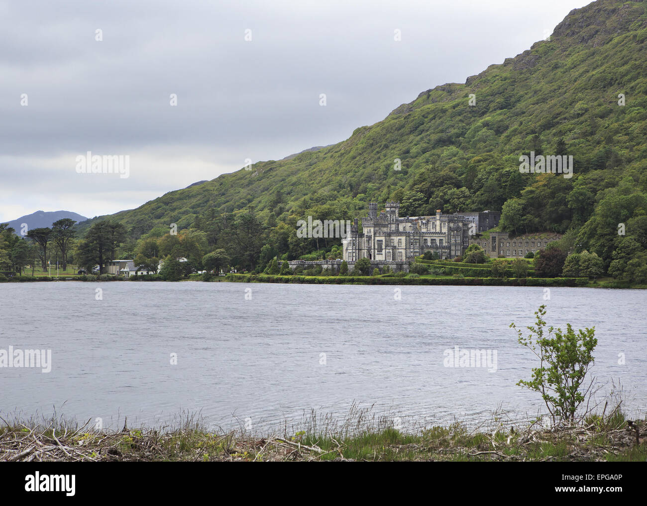 Kylemore Abbey in mountains on the lake Stock Photo - Alamy